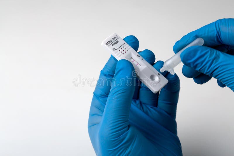 Positive Test Result by Using Rapid Test Device for COVID-19 Stock ...