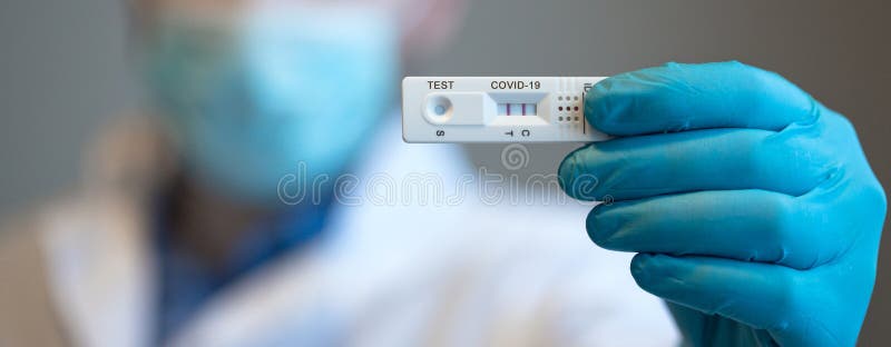 Positive Test Result by Using Rapid Test Device for COVID-19 Stock ...