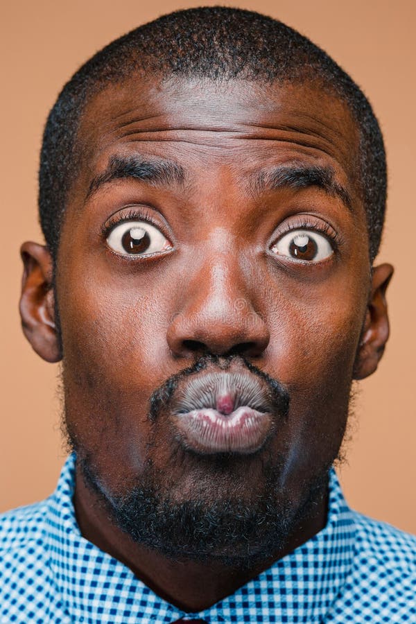 Positive Thinking African-American Man on Brown Background Stock Image ... Positive Thinking African-American Man on Brown Background Stock Image ...