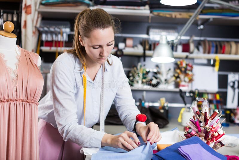 Woman Worker Sew Up Textile Material at Sewing Workshop Stock Photo ...