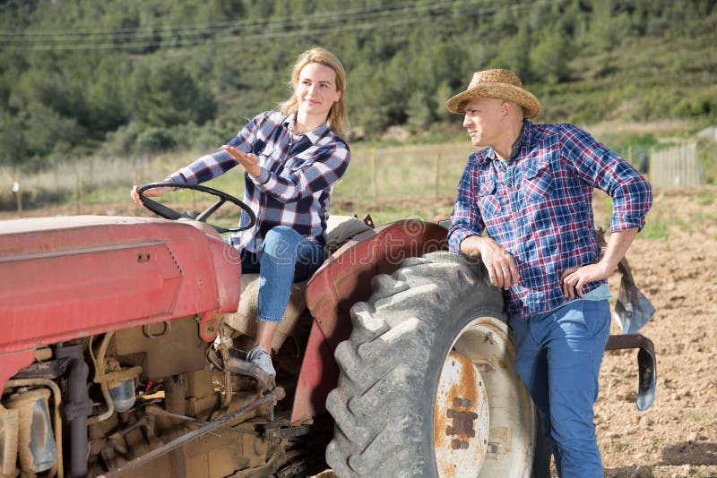 Woman Working on Small Farm Tractor Stock Photo - Image of agricultural ...