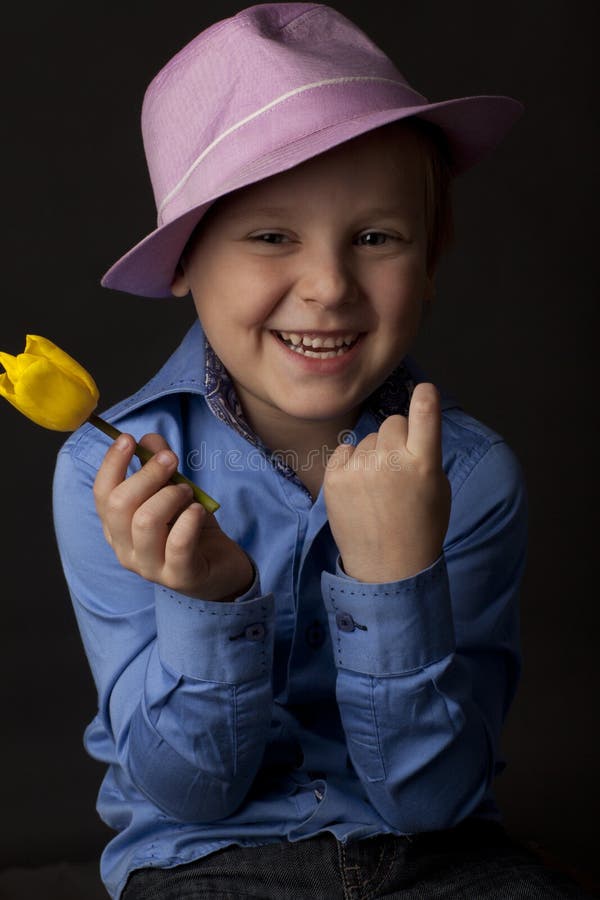 Boy with hat and flower stock image. Image of handsome - 29747235