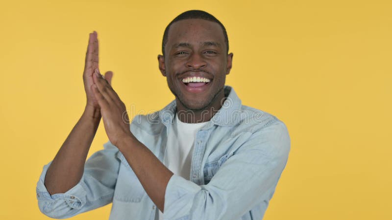 Positive Young African Man Clapping, Yellow Background Stock Video ...