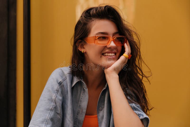 Positive Young Caucasian Woman Looking into Distance Smiling Sitting ... Positive Young Caucasian Woman Looking into Distance Smiling Sitting ...