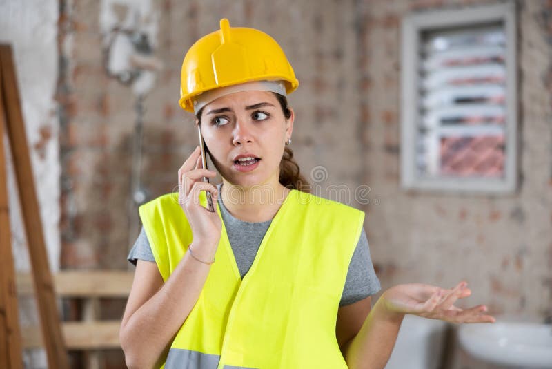 Woman Builder Talking on Phone Construction Site Stock Photo - Image of ...