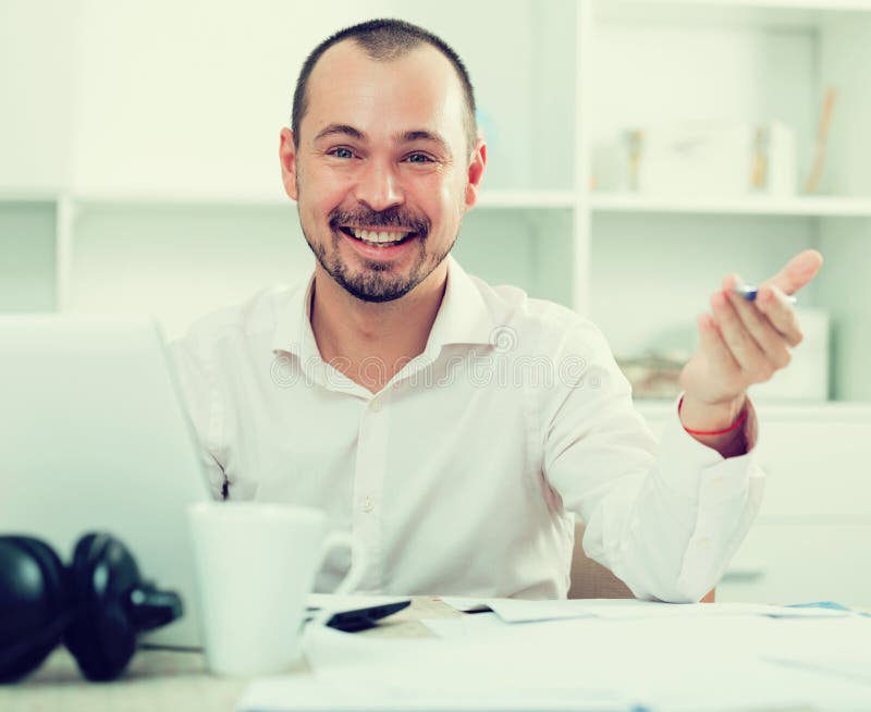 Positive Young Man in Office Stock Image - Image of occupation, idea ...