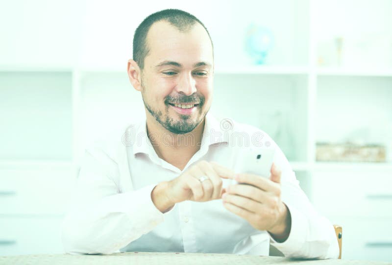 Positive Young Man with Smartphone Stock Image - Image of agree, face ...