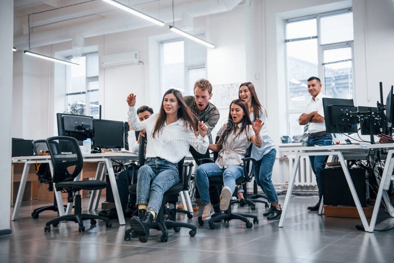 Positive Young People Have Fun at Break Time in the Office Stock Photo ...