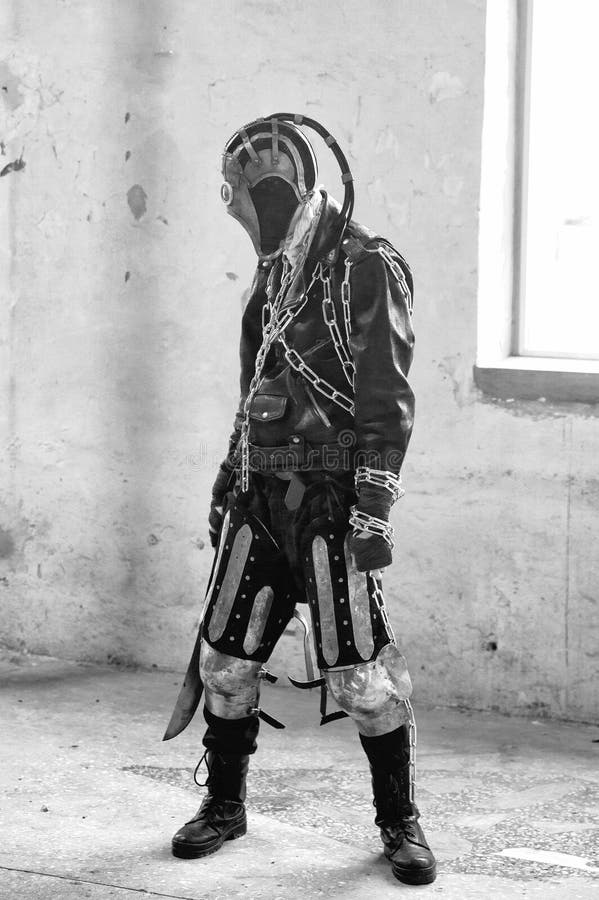 Post Apocalyptic Mutant Creature or Survivor in Gas Mask with Machete ...