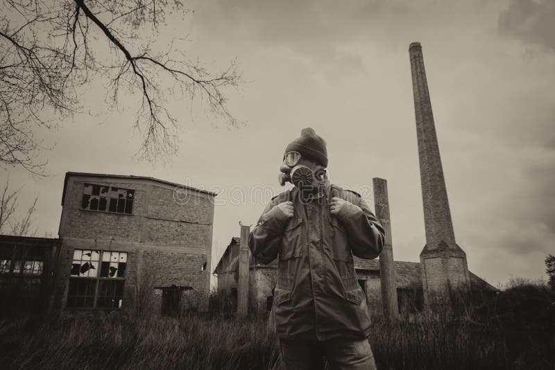 Post Apocalyptic Survivor in Gas Mask and Backpack Stock Image - Image ...