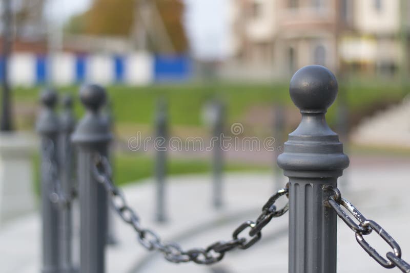 Post with chain closeup stock photo. Image of blurred - 102019770