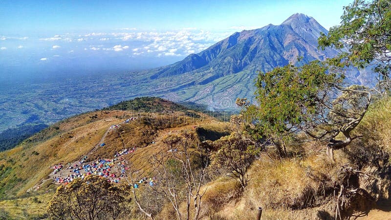 Post 3 Climbing Mount Merbabu with Mount Merapi As a Background Stock ...