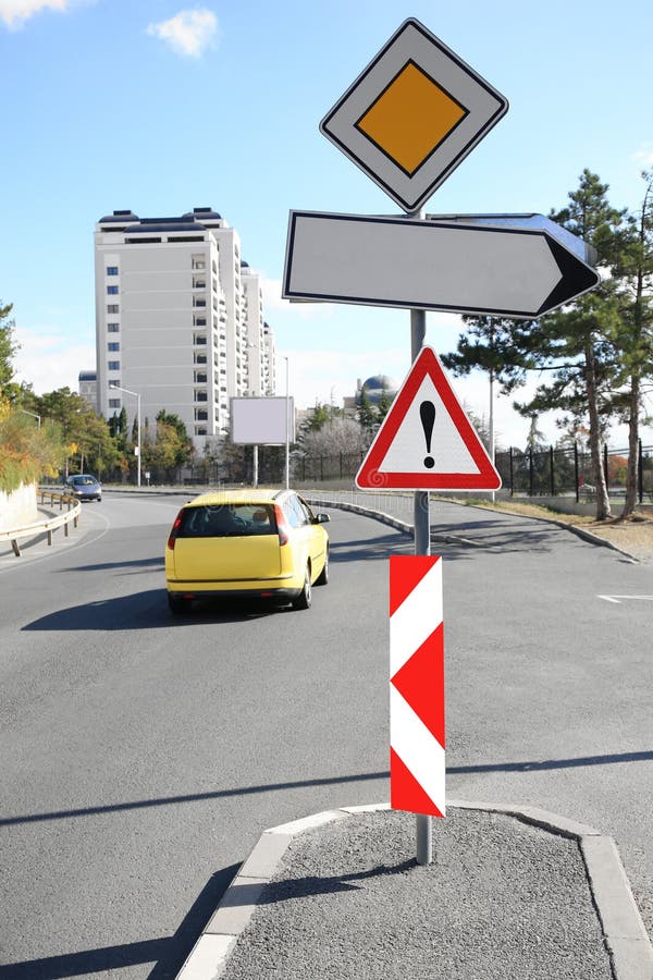 Post with Different Road Signs on City Street Stock Photo - Image of ...