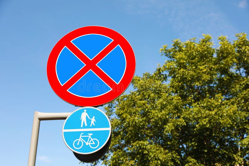 Post with Different Road Signs Outdoors. Space for Text Stock Image ...