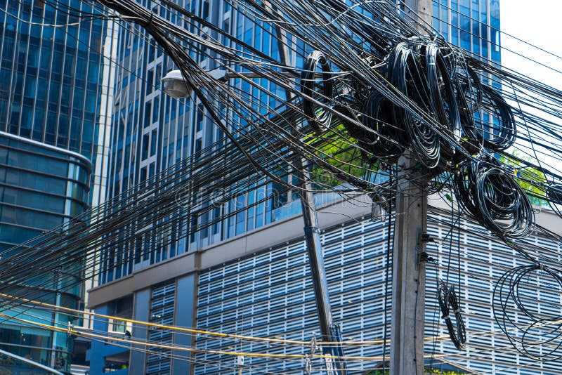 Post with Electrical Wiring in Thailand. Coils of Wires Stock Image ...