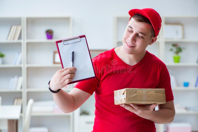 The Post Man Delivering a Parcel Package Stock Photo - Image of ...