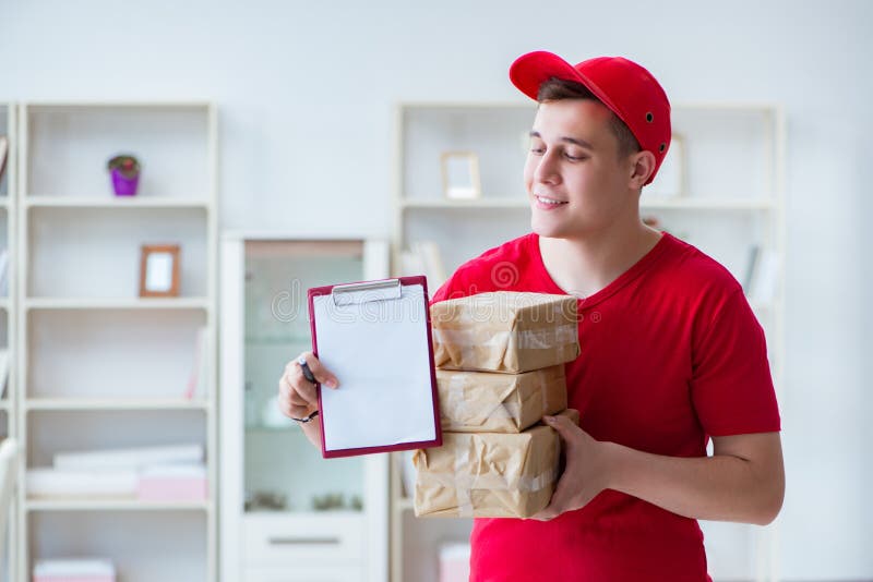 The Post Man Delivering a Parcel Package Stock Photo - Image of ...