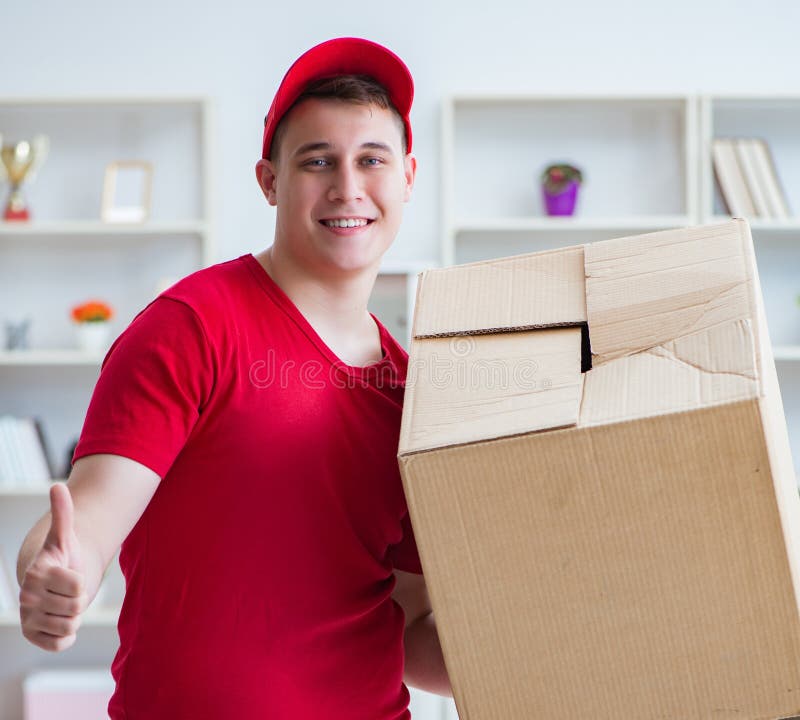 Post Man Delivering a Parcel Package Stock Photo - Image of order, mail ...