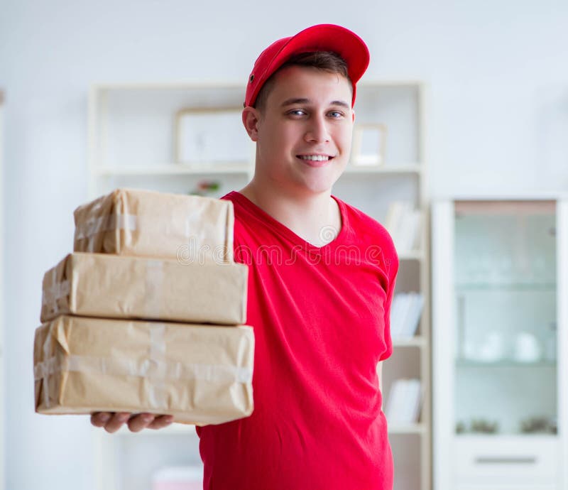 Post Man Delivering a Parcel Package Stock Photo - Image of order, mail ...