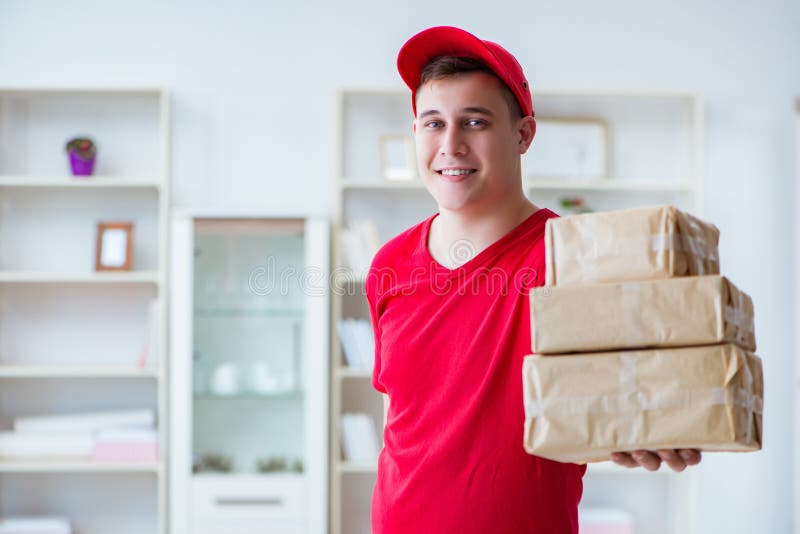 The Post Man Delivering a Parcel Package Stock Photo - Image of ...