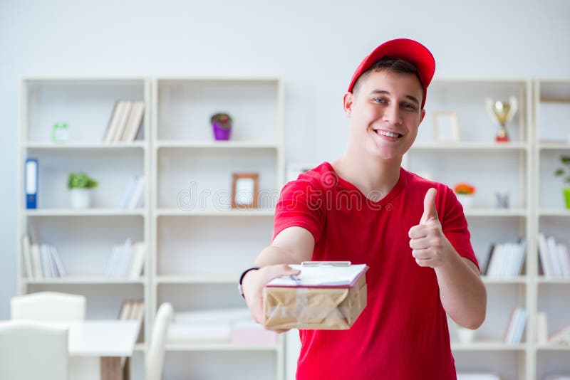 The Post Man Delivering a Parcel Package Stock Photo - Image of ...