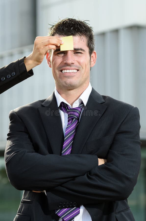 Post-it in man forehead stock photo. Image of remind - 26377354