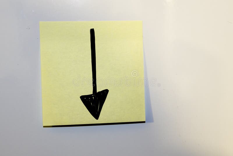 Post-it Note with an Arrow Written in Black Stock Photo - Image of ...