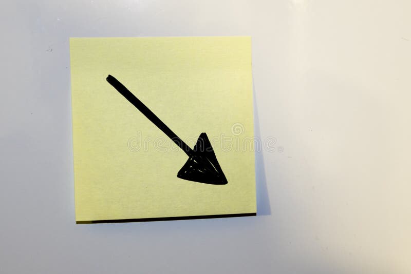 Post-it Note with an Arrow Written in Black Stock Image - Image of ...