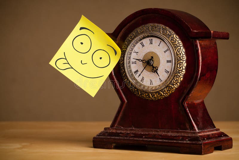 Post-it Note with Smiley Face Sticked on a Clock Stock Photo - Image of ...