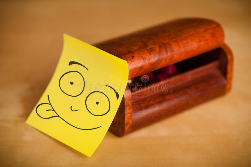 Post-it Note with Smiley Face Sticked on a Jewelry Box Stock Photo ...