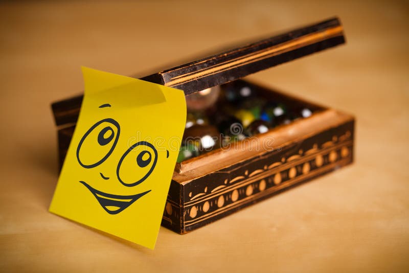 Post-it Note with Smiley Face Sticked on Jewelry Box Stock Photo ...