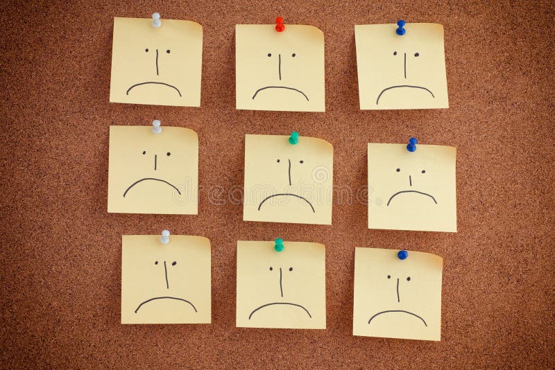Post it Notes with Smiley Face and Sad Faces on Bulletin Board Stock ...