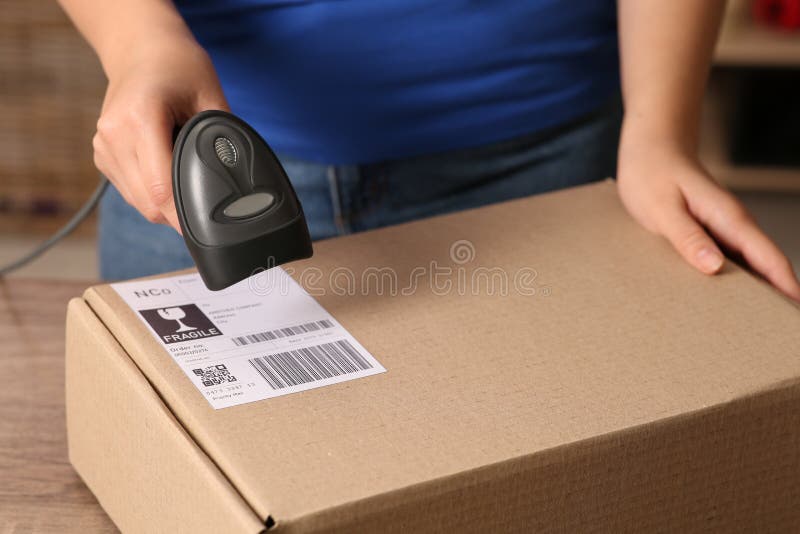 Post Office Worker Sticking Barcode on Parcel at Counter Indoors ...