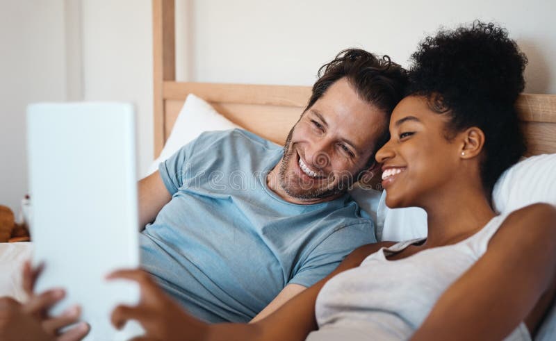 This Post is so Relatable. a Couple Using a Digital Tablet while Lying ...