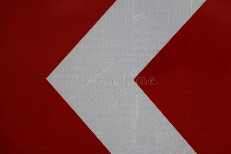 A Post-shot of a Warning Sign for a Sharp Left Turn Stock Image - Image ...