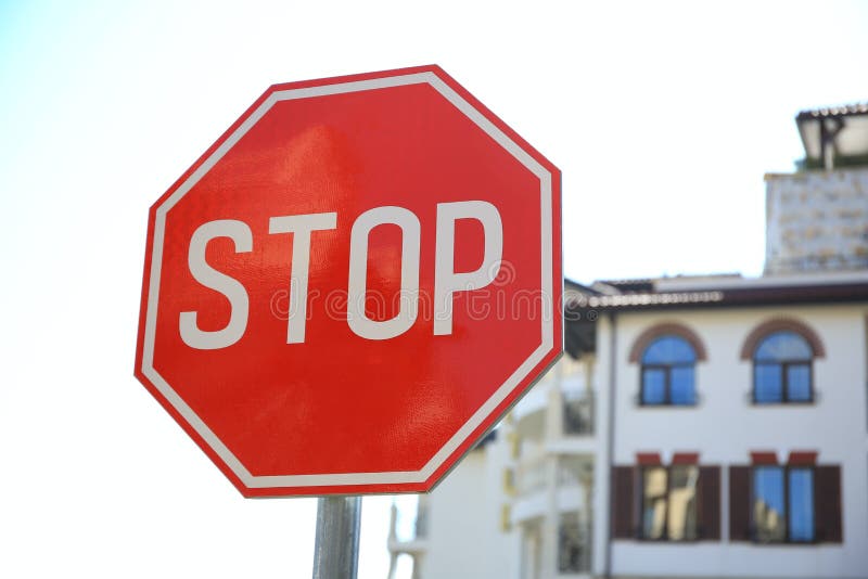 Post with Stop Sign on City Street Stock Photo - Image of restriction ...