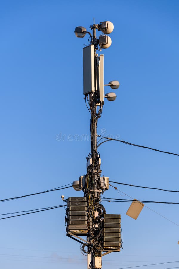 A Post with Telecommunications Equipment. Equipment and Cables for ...