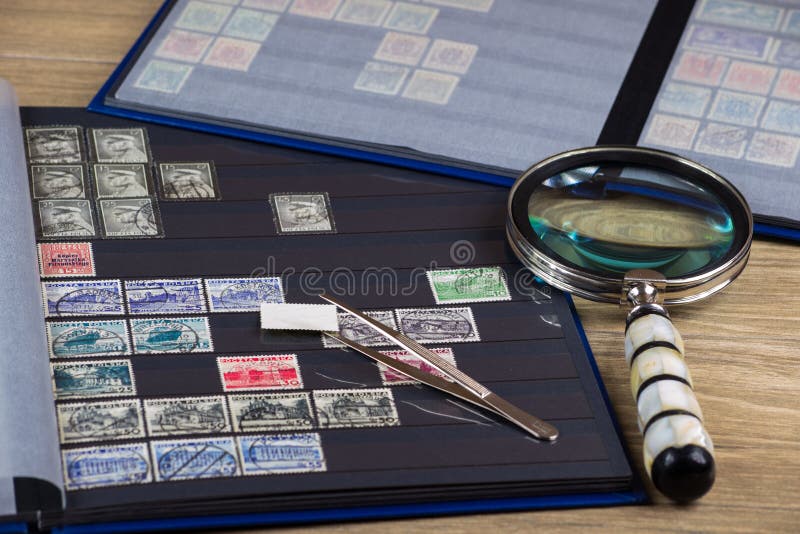 Postage stamps collection editorial photography. Image of tweezers ...