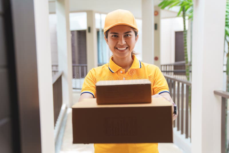 Postal Lady Delivers the Mailbox in Front of the House Stock Photo ...