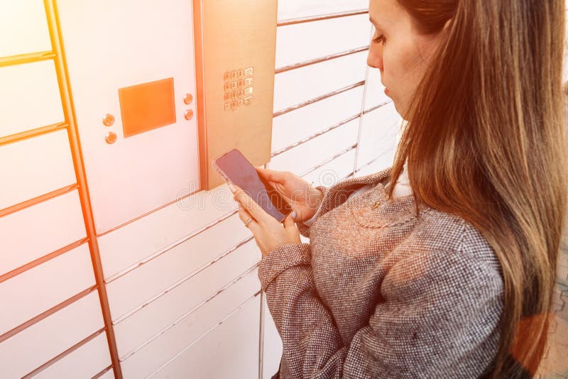 Postal Terminal. Post Delivery Automat Service and Hands with Parcel ...