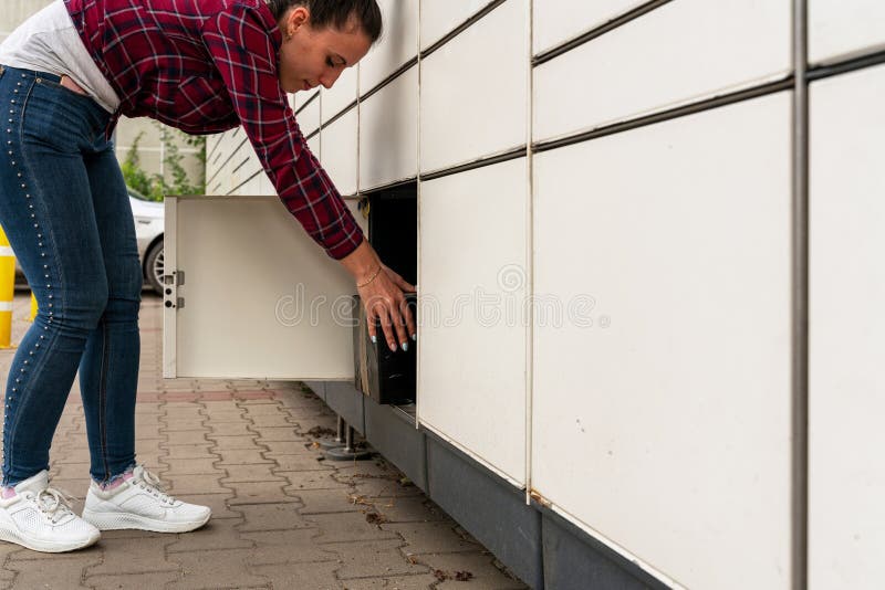 Postal Terminal. Post Delivery Automat Service and Hands with Parcel ...