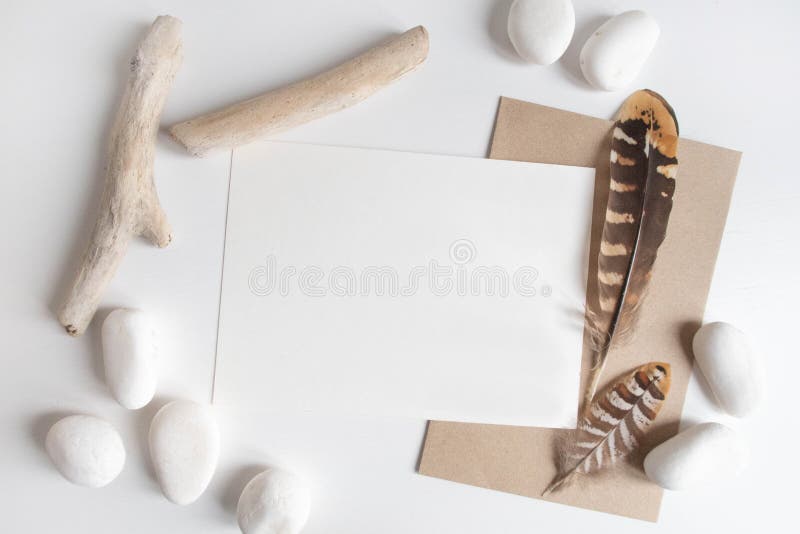Postcard Mockup among Rustic Elements, Stcks, White Pebble and Feathers ...