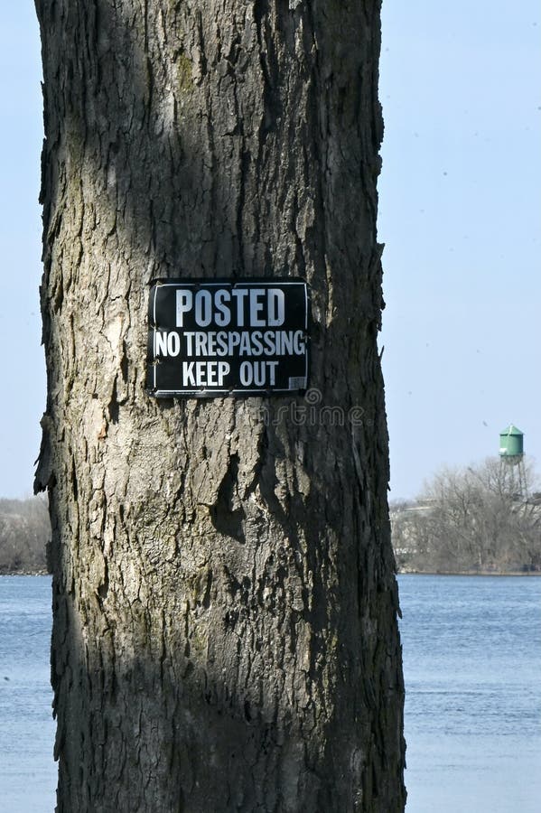 Posted No Trespassing Sign on a Tree Stock Image - Image of property ...