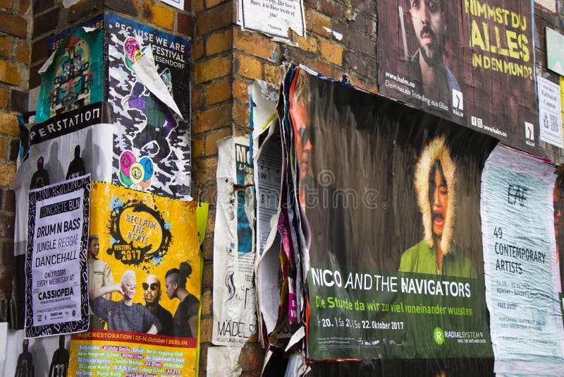 Posters on the street wall editorial stock image. Image of alphabet ...