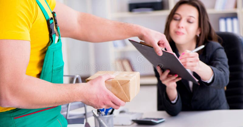 The Postman Delivering Parcel To the Office Stock Photo - Image of ...