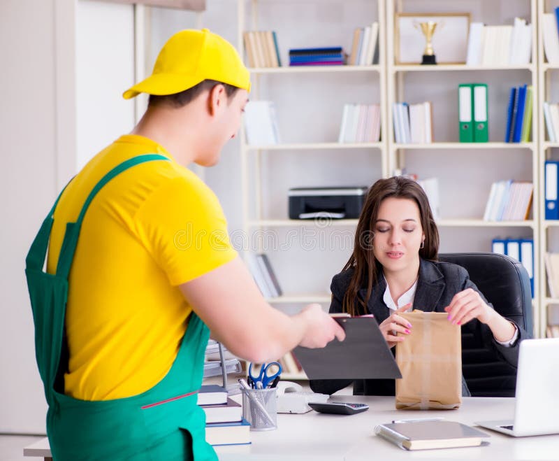 Postman Delivering Parcel To the Office Stock Photo - Image of ...