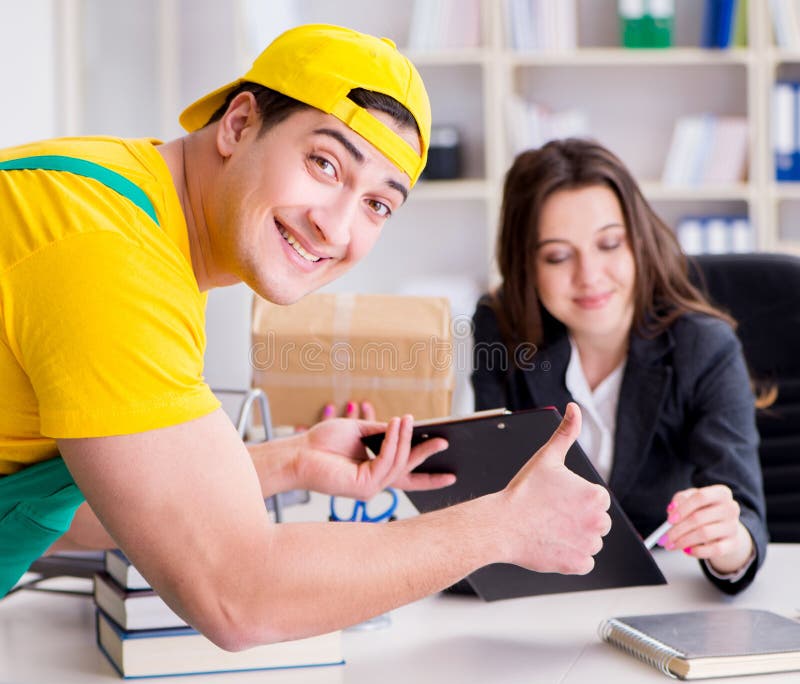 Postman Delivering Parcel To the Office Stock Photo - Image of ...