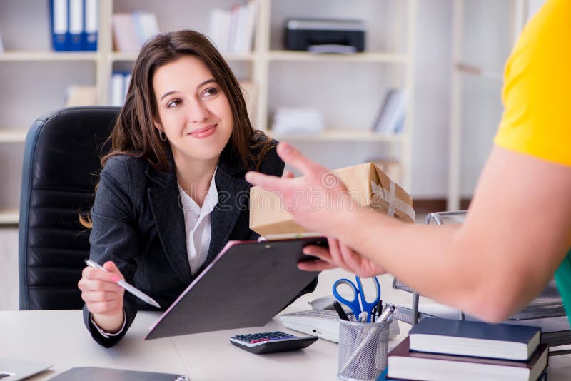 The Postman Delivering Parcel To the Office Stock Image - Image of ...