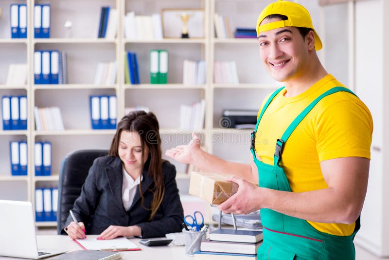 The Postman Delivering Parcel To the Office Stock Photo - Image of ...