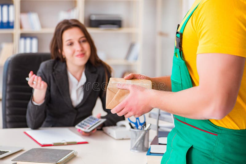 The Postman Delivering Parcel To the Office Stock Photo - Image of ...